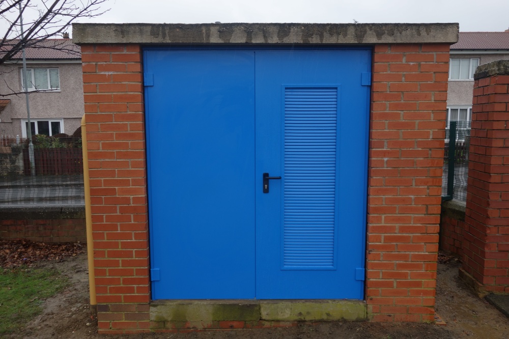 Steel Door Vision panels - powder coat and stainless steel.