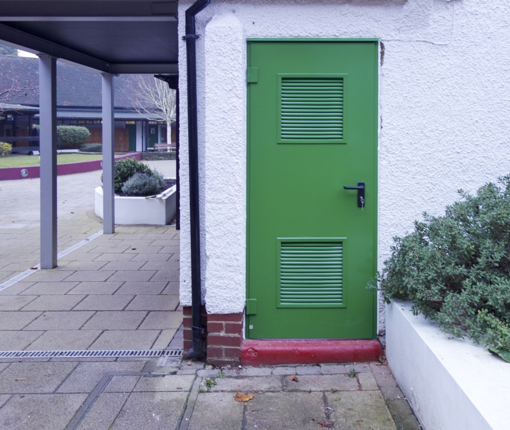 Steel Door Vision panels - powder coat and stainless steel.