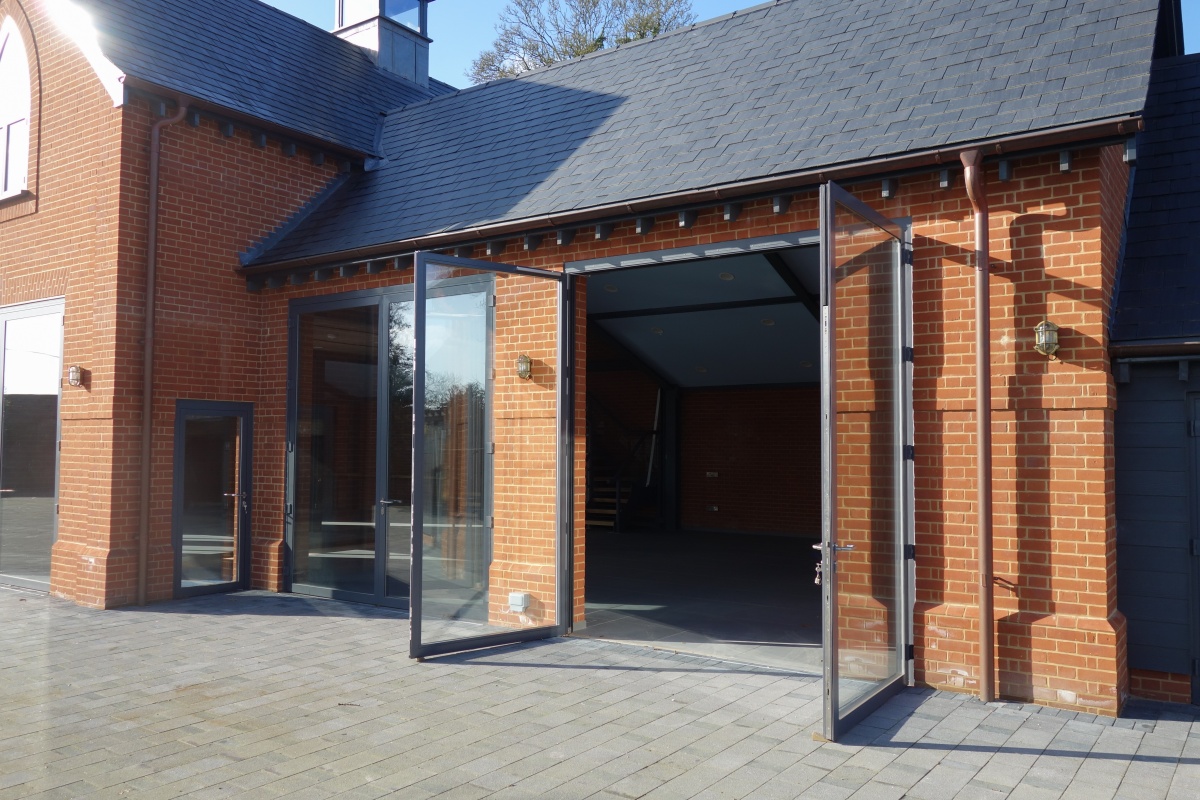 Large glazed doors for classic vehicle collection